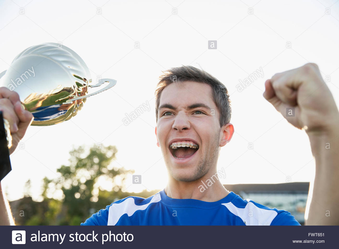 Teenage sport trophy hi-res stock photography and images - Alamy