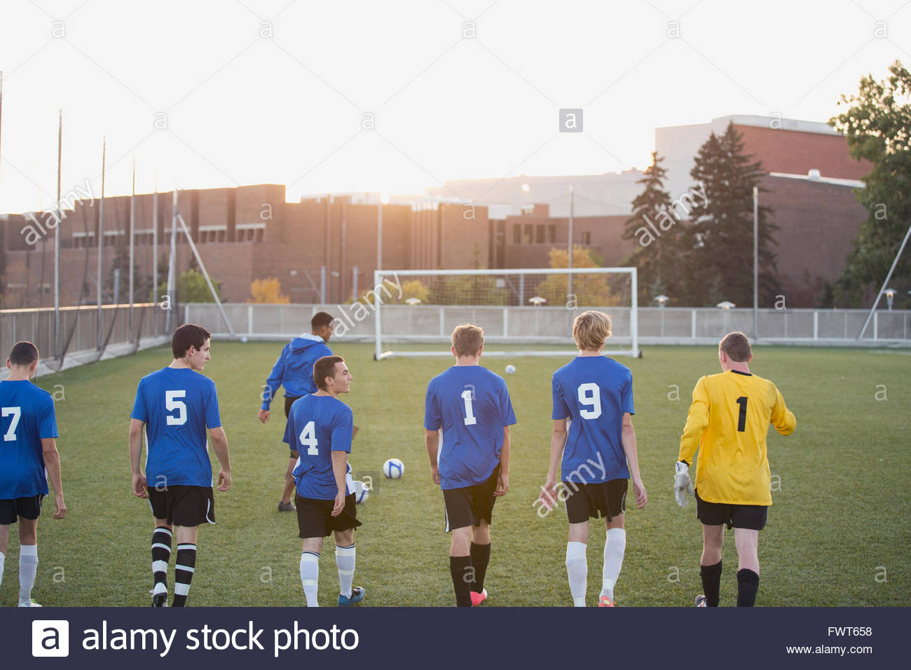 Man and boy walking from behind hi-res stock photography and images - Alamy