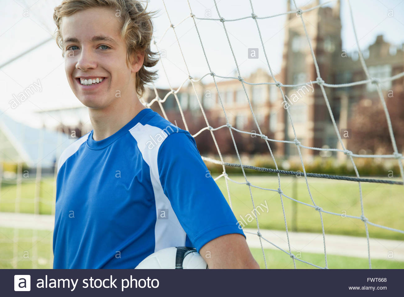 Portrait of teenage soccer player Stock Photo - Alamy