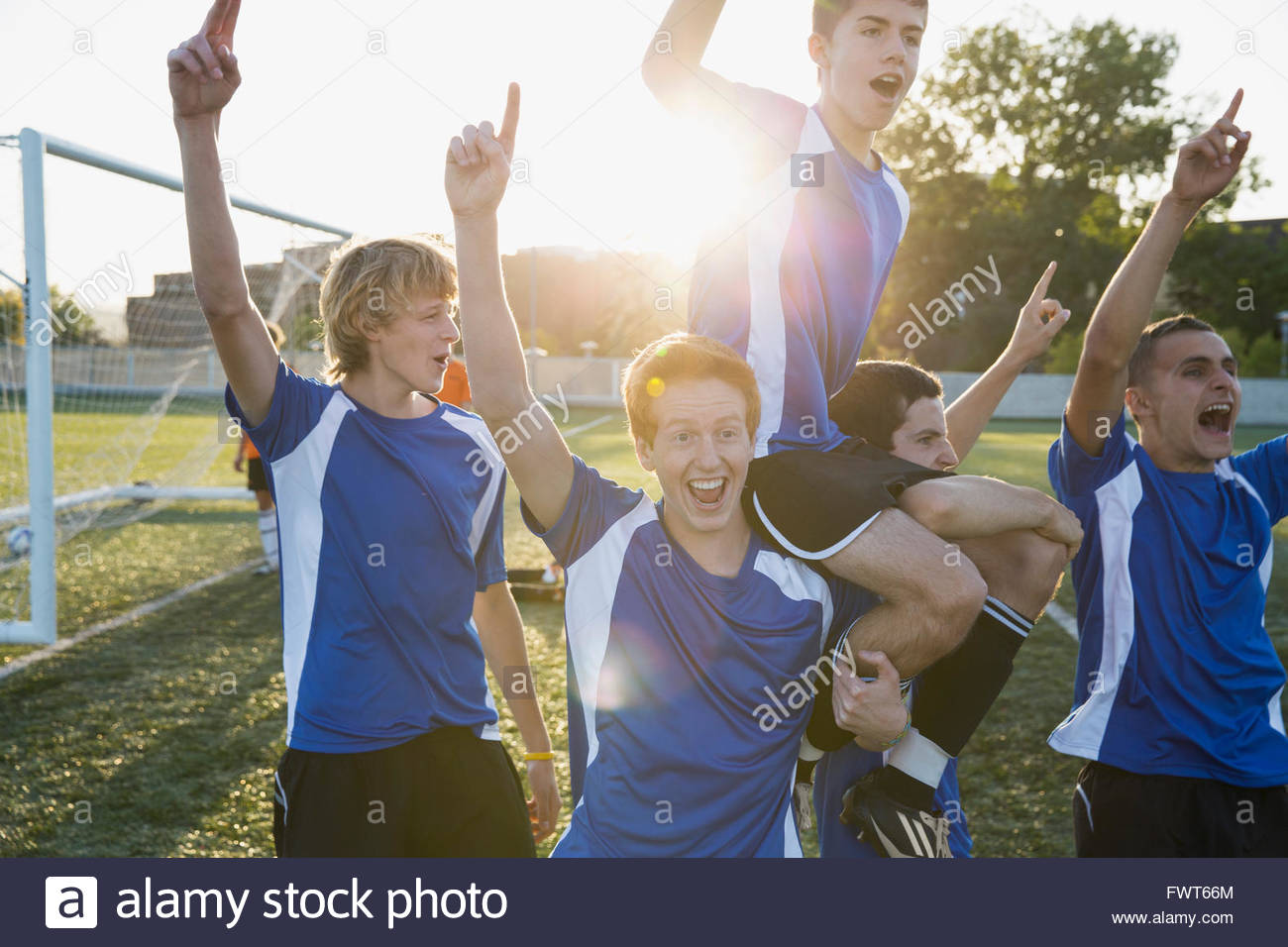 Cheering and with a hi-res stock photography and images - Alamy