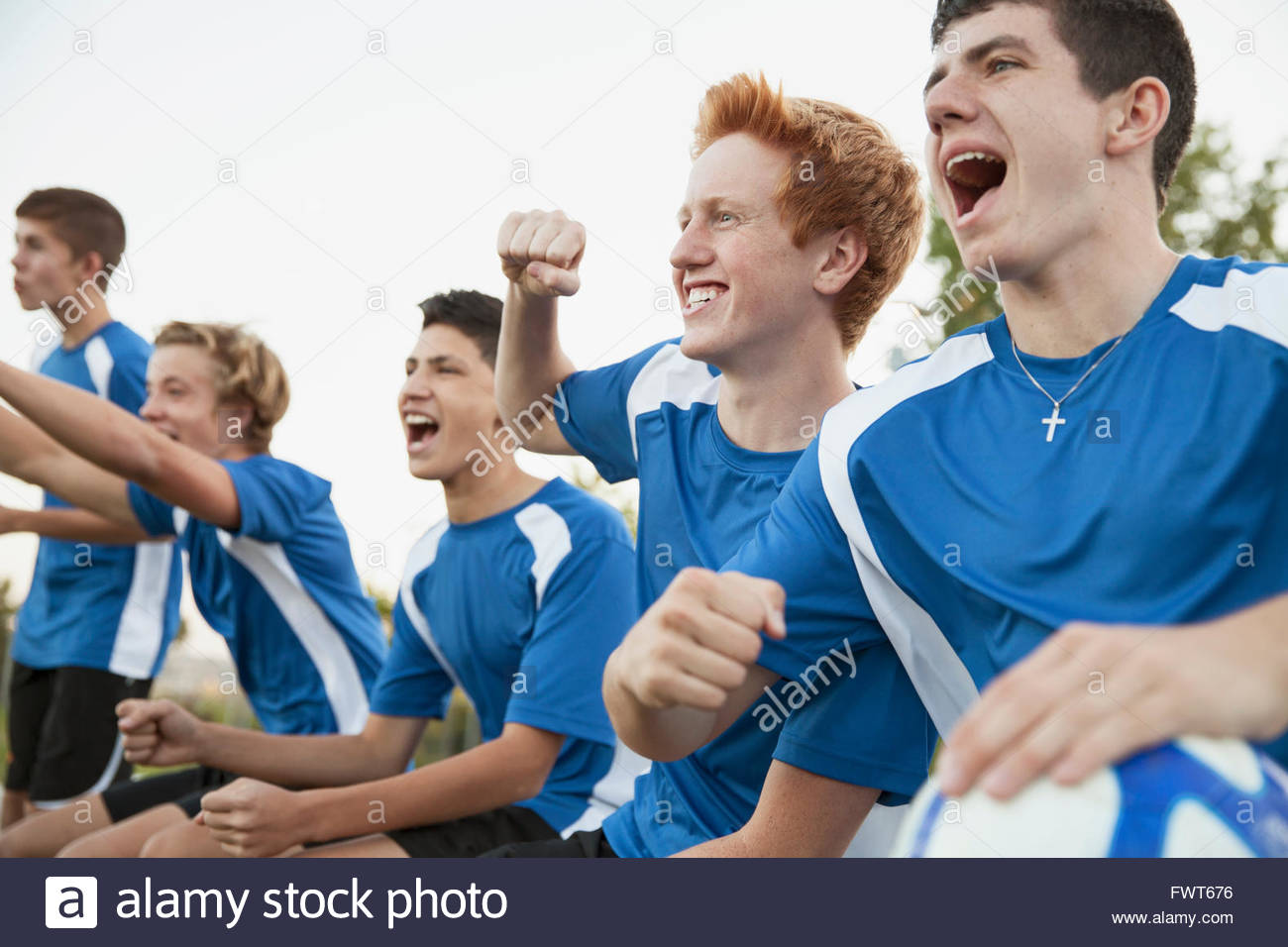 Boy soccer bench hi-res stock photography and images - Alamy