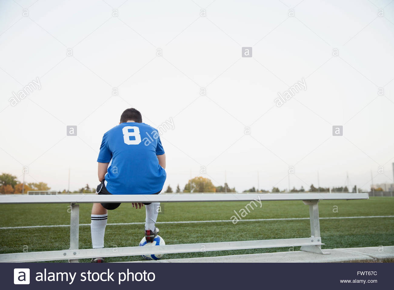 Teenager sitting from behind hi-res stock photography and images - Alamy