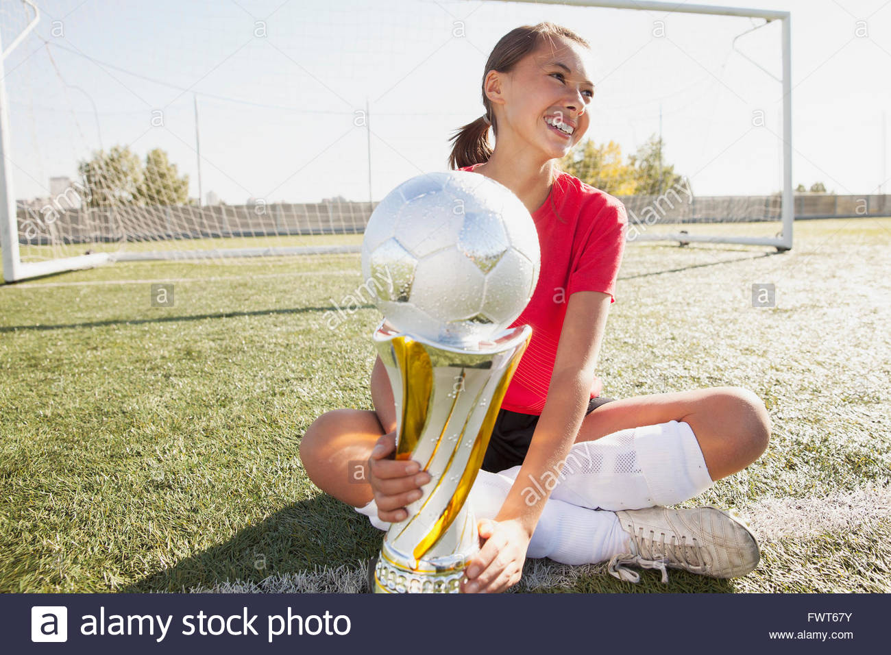 Soccer player sitting hi-res stock photography and images - Alamy