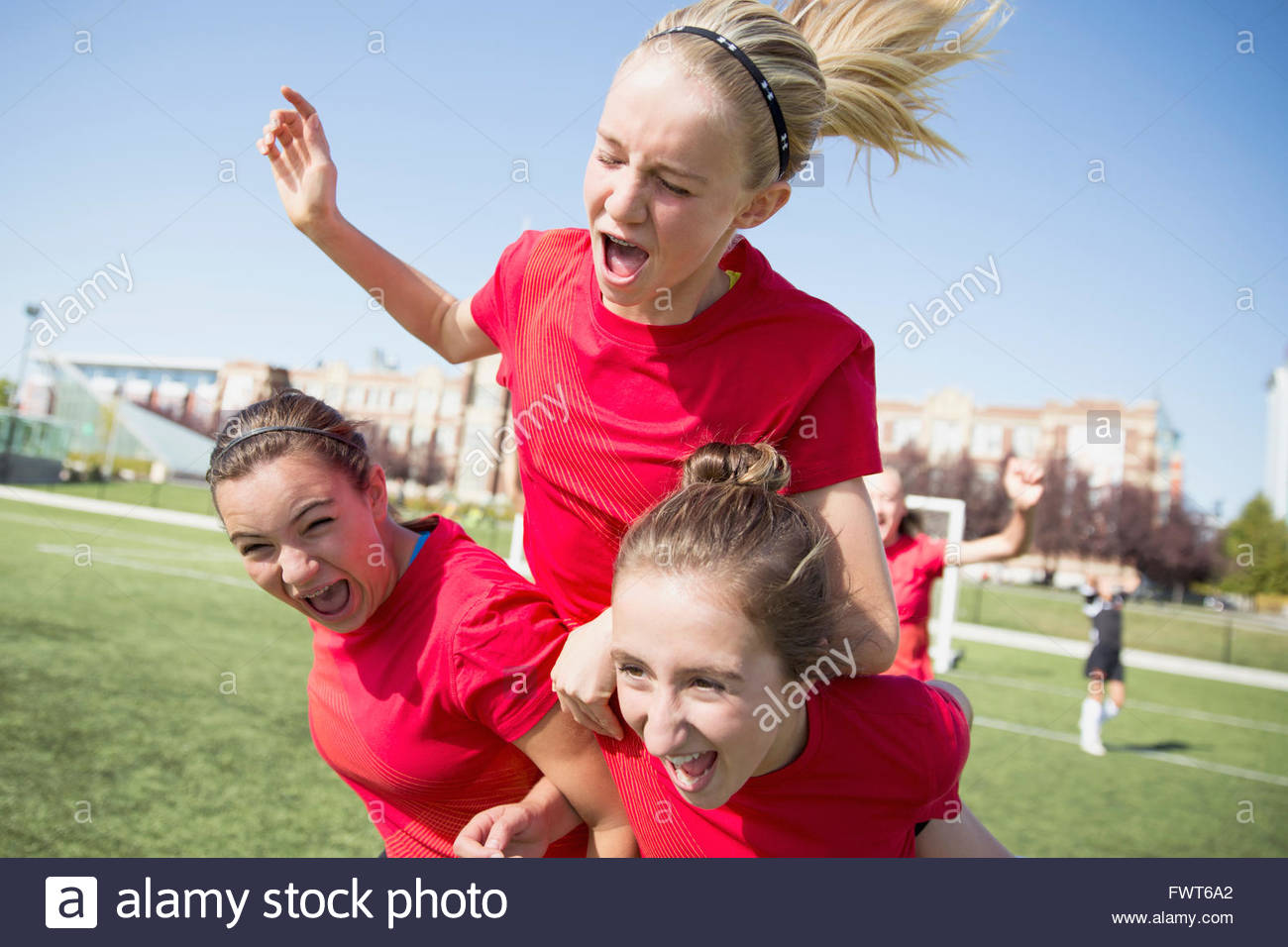 Girl cheering win hi-res stock photography and images - Alamy
