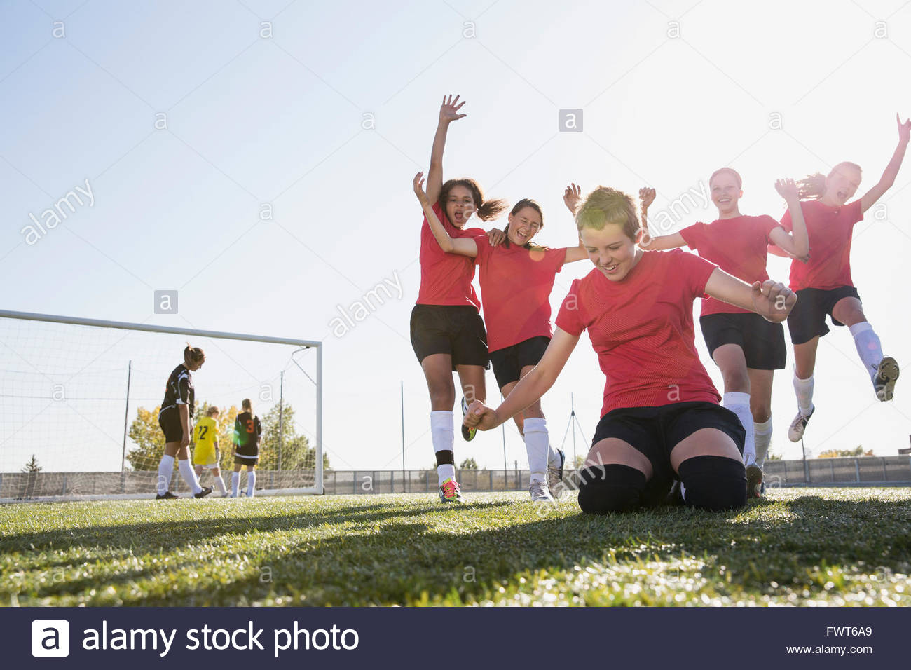 Girl cheering win hi-res stock photography and images - Alamy
