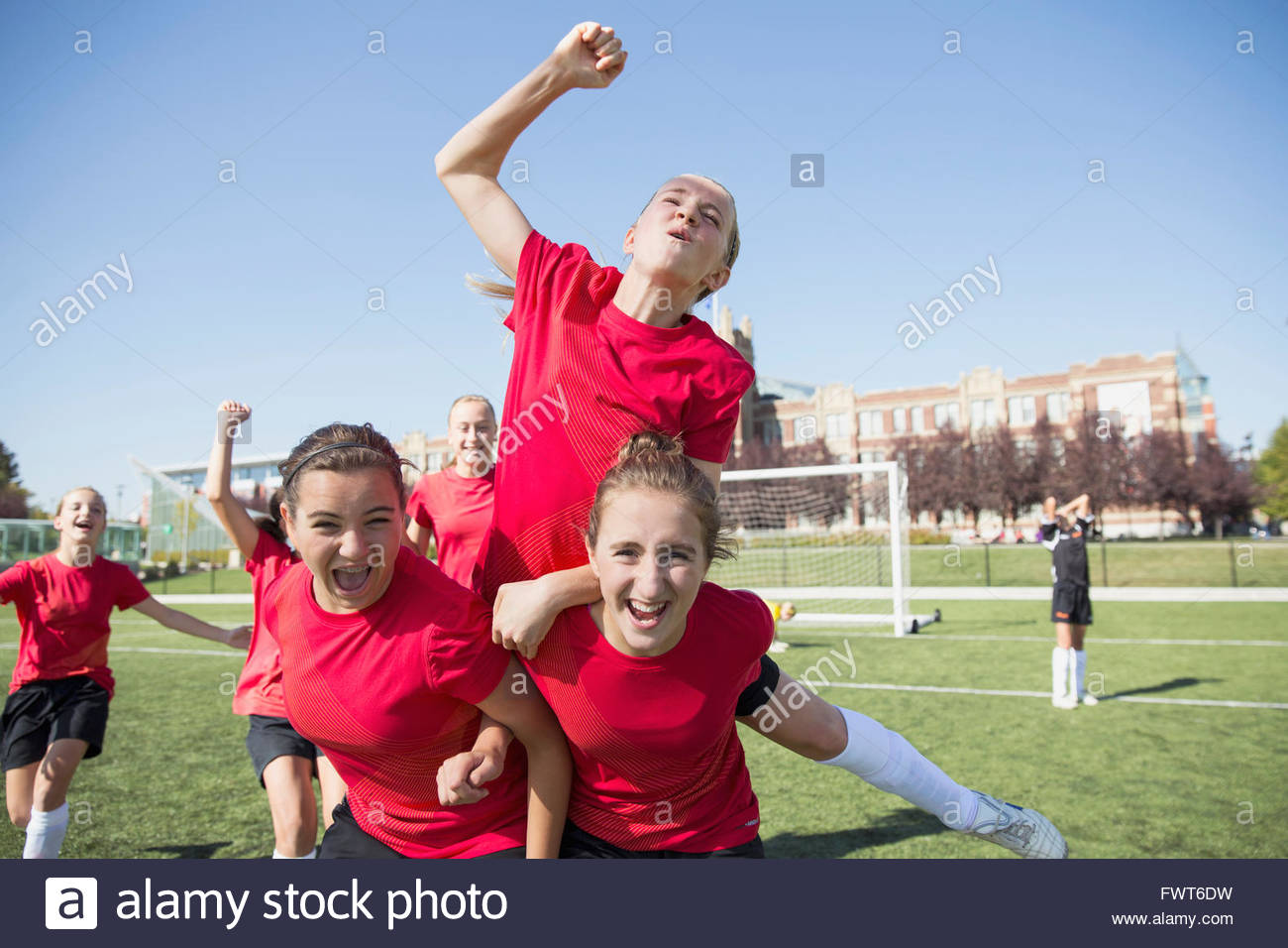 Girl cheering win hi-res stock photography and images - Alamy