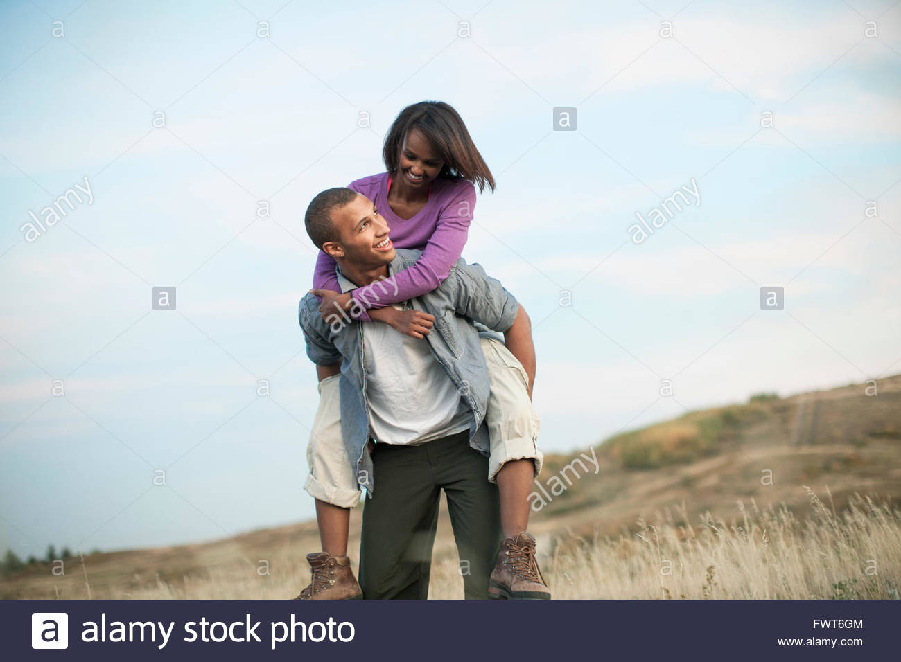 A piggyback ride hi-res stock photography and images - Alamy