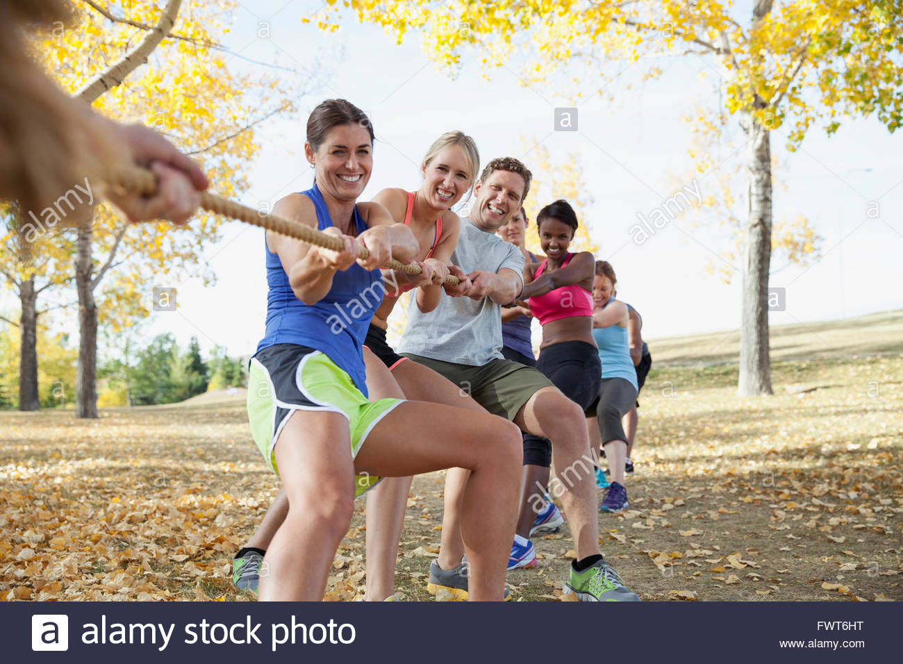Bending over pulling hi-res stock photography and images - Alamy