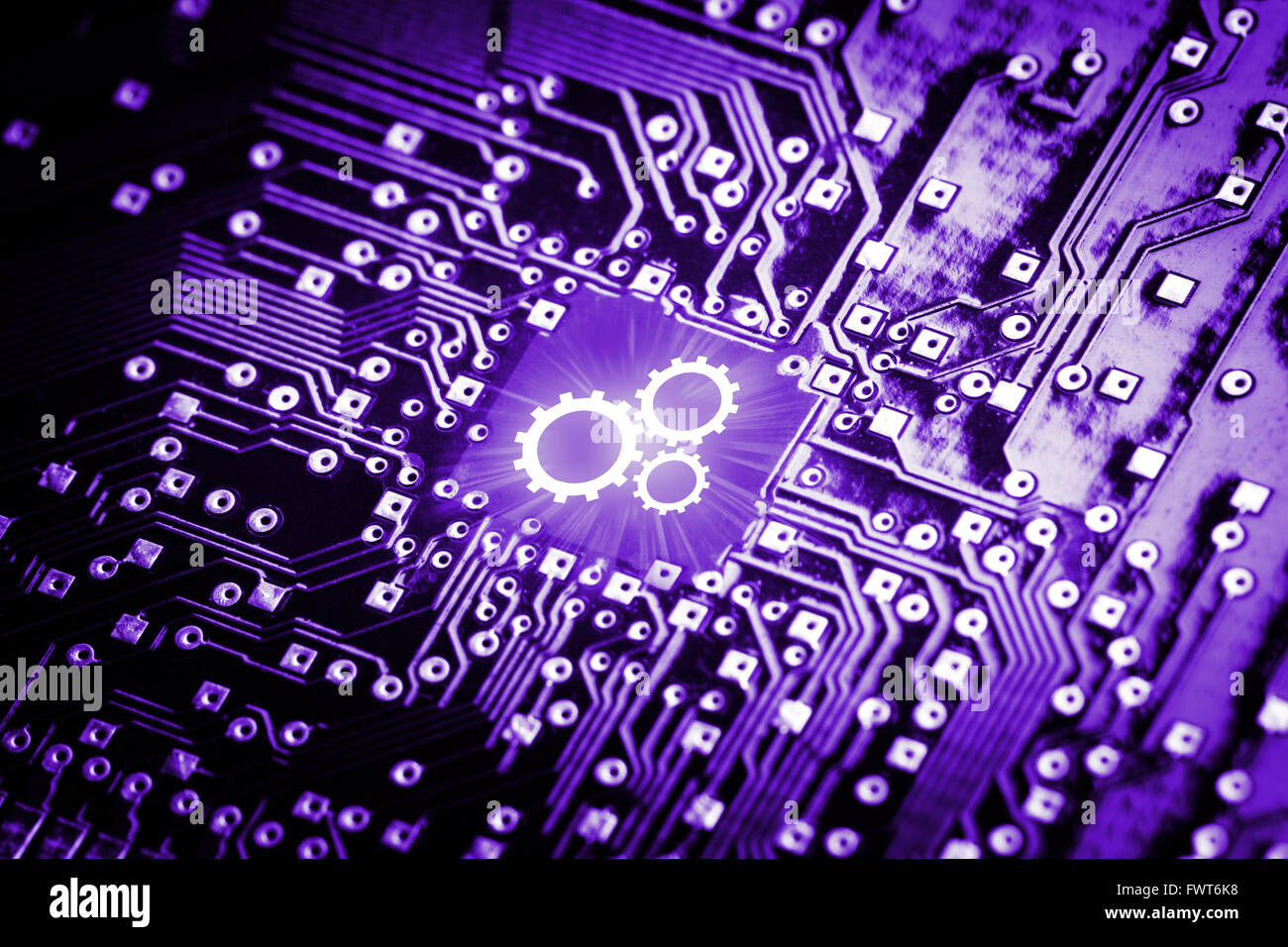 Gears icon on computer chip Stock Photo - Alamy