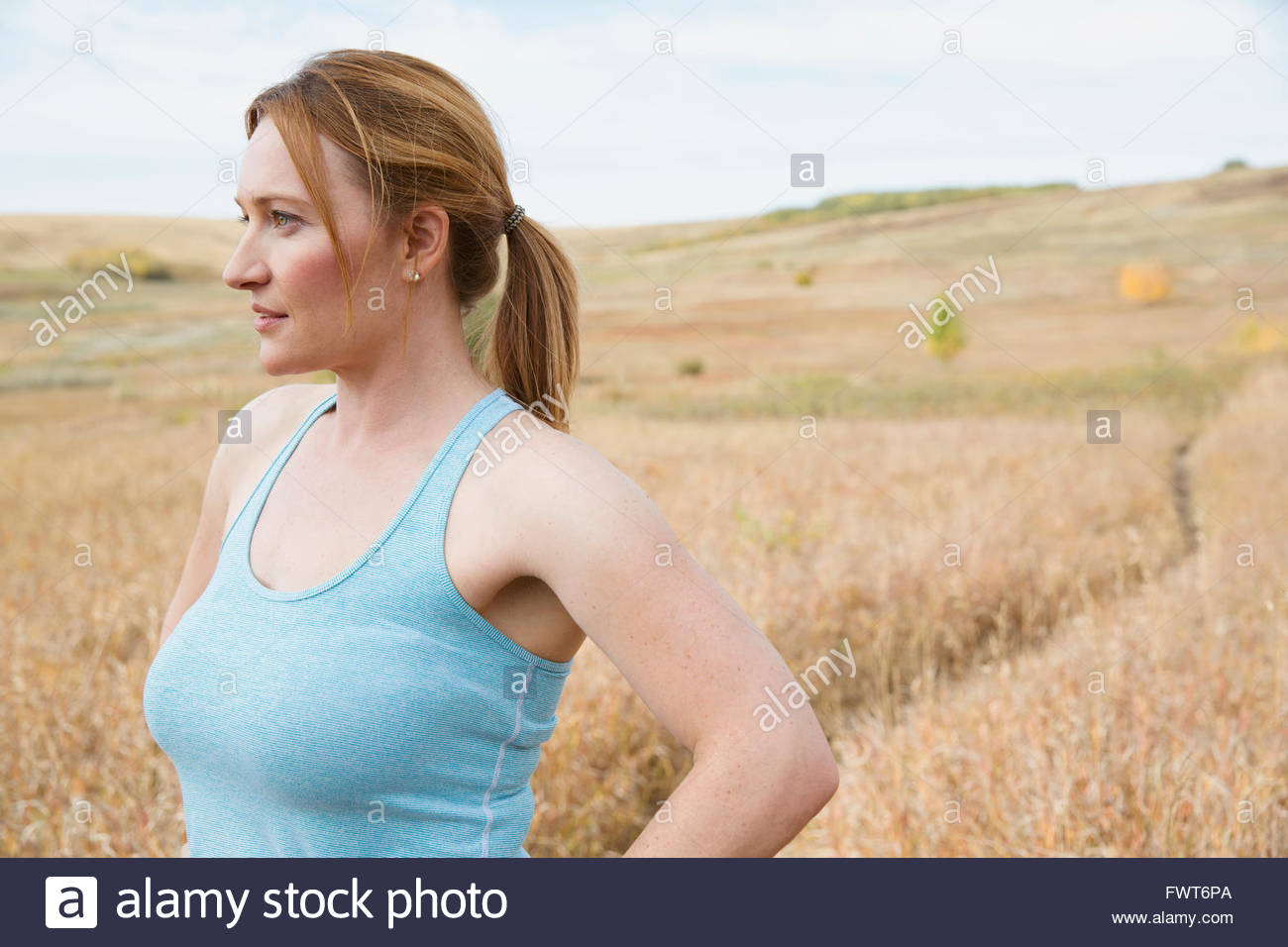 Profile of woman on outdoor pathway Stock Photo - Alamy