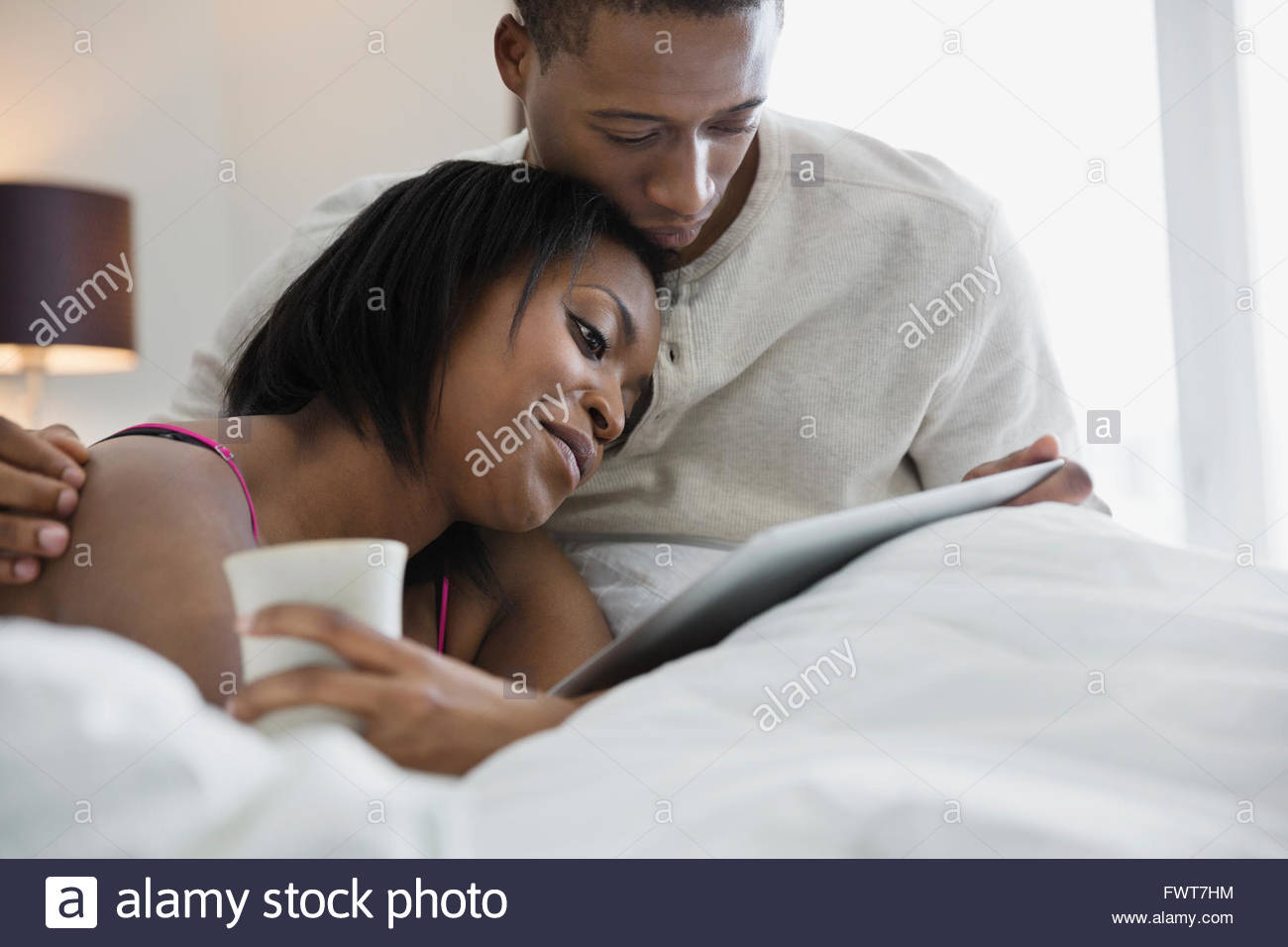 Sharing bed hi-res stock photography and images - Alamy