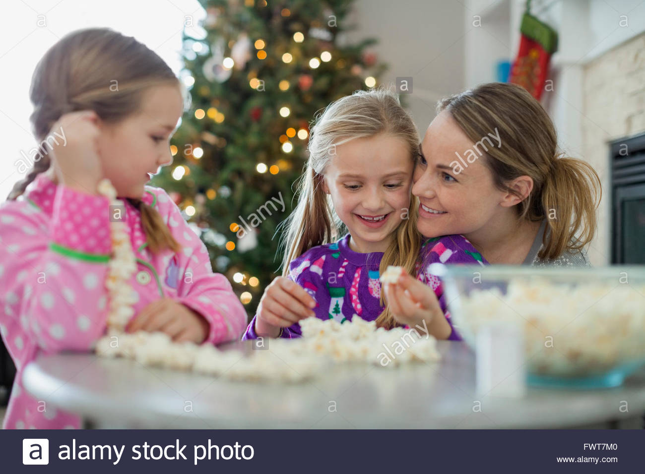 Children and holiday tradition popcorn hi-res stock photography and ...