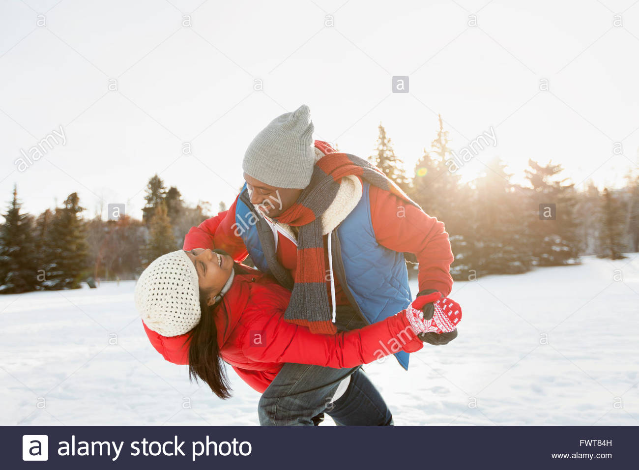 Romantic couple dancing outdoors in winter Stock Photo - Alamy