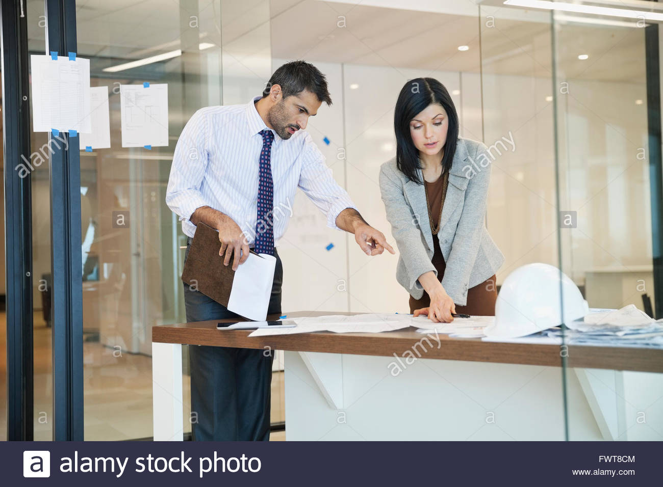 Businessman reviewing documents hi-res stock photography and images - Alamy Businessman reviewing documents hi-res stock photography and images - Alamy