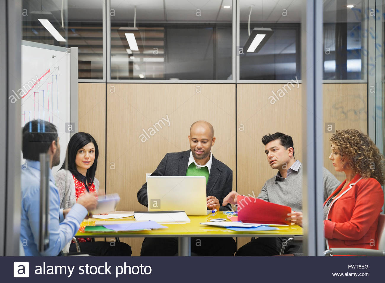Business people having a discussion in board room Stock Photo - Alamy