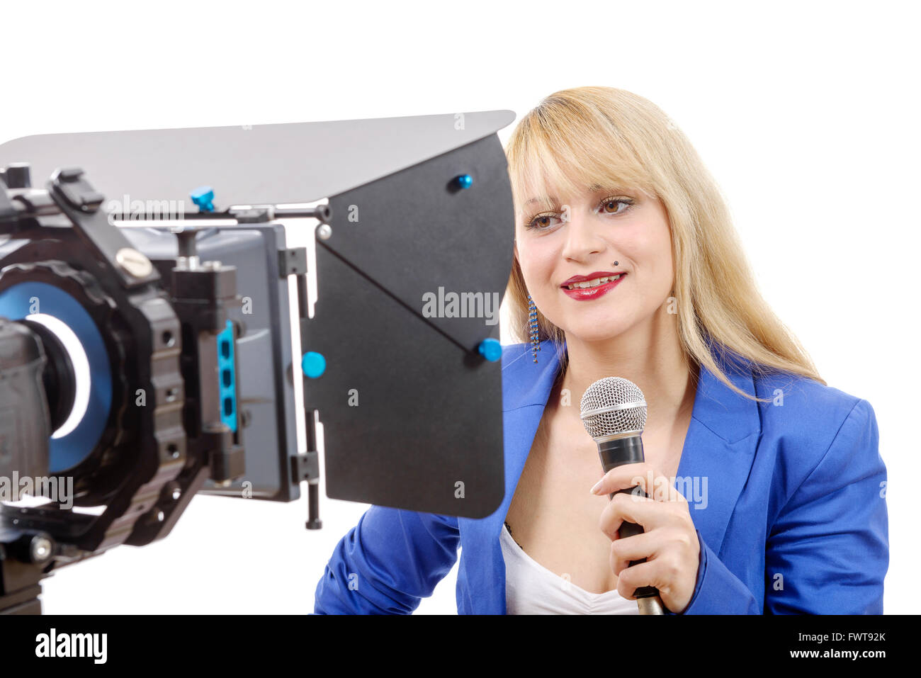 a portrait of elegant blonde woman TV reporter, who is smiling Stock ...