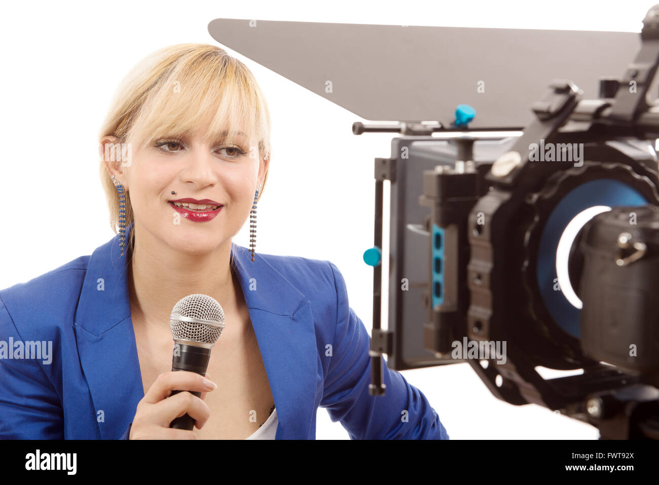a portrait of elegant blonde woman TV reporter, who is smiling Stock ...