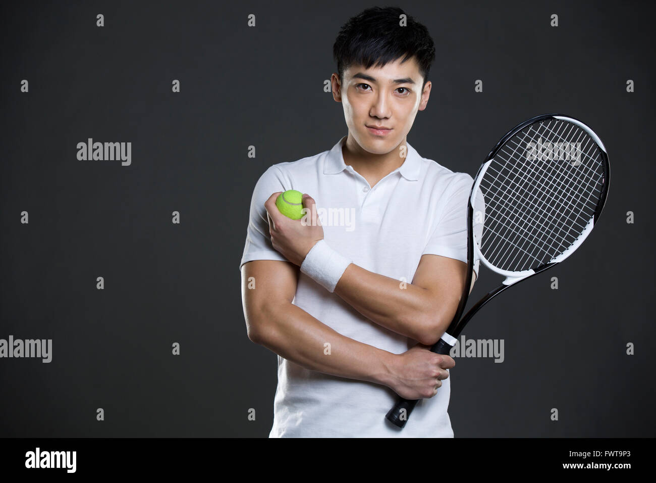 Modern tennis racket holding ball hi-res stock photography and images ...