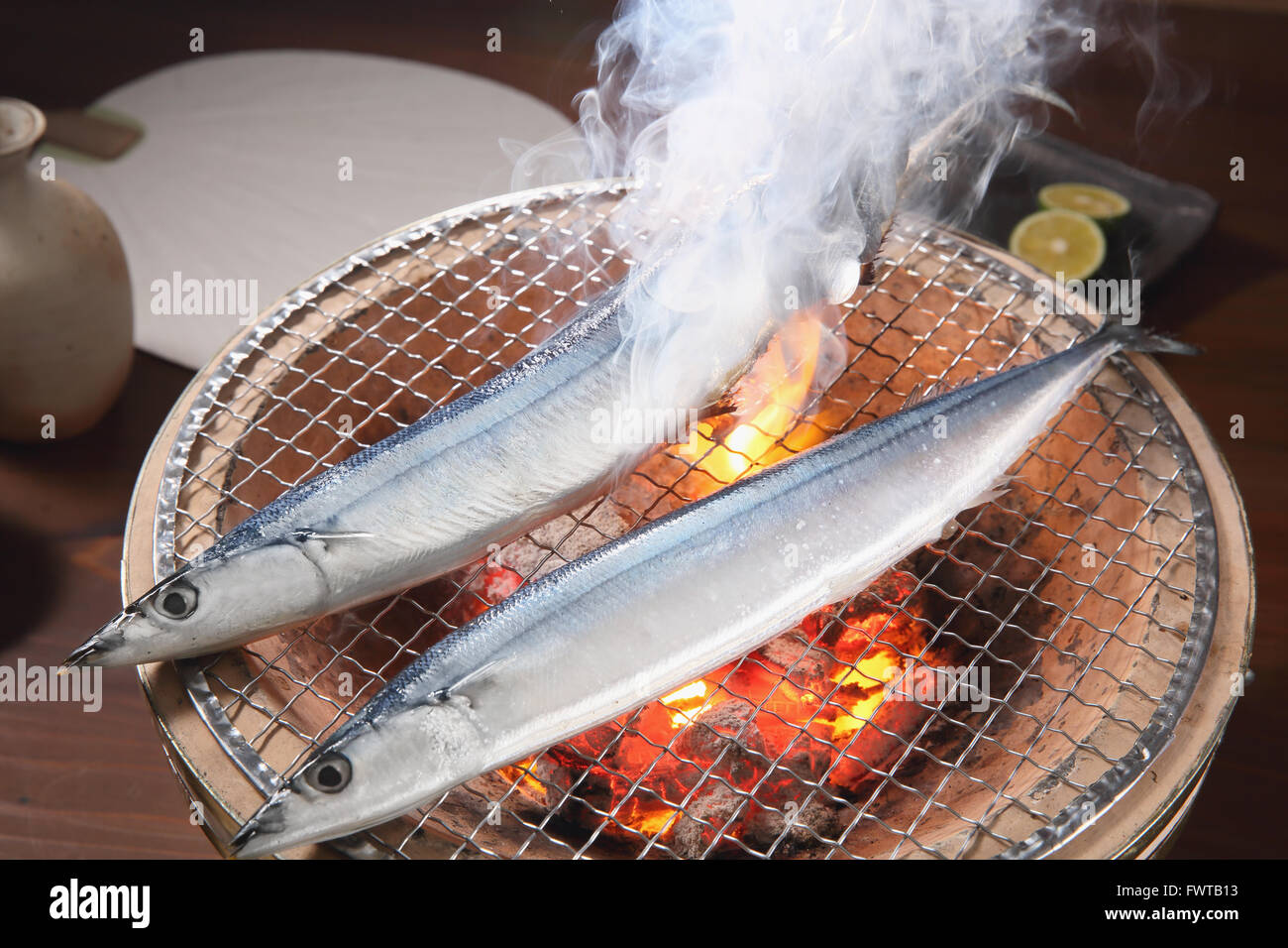 Grilled Pacific saury Stock Photo - Alamy