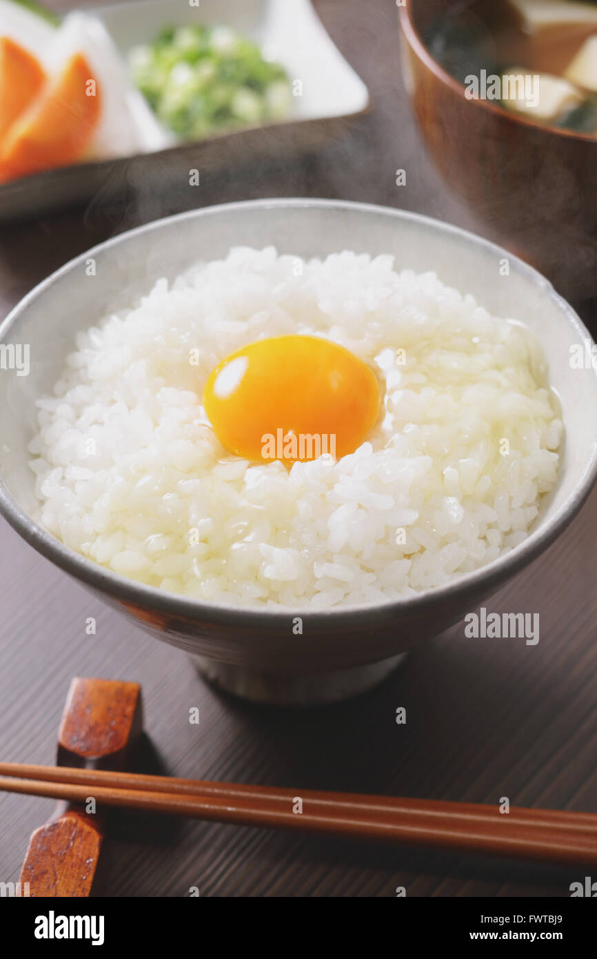 Rice and raw egg Stock Photo - Alamy