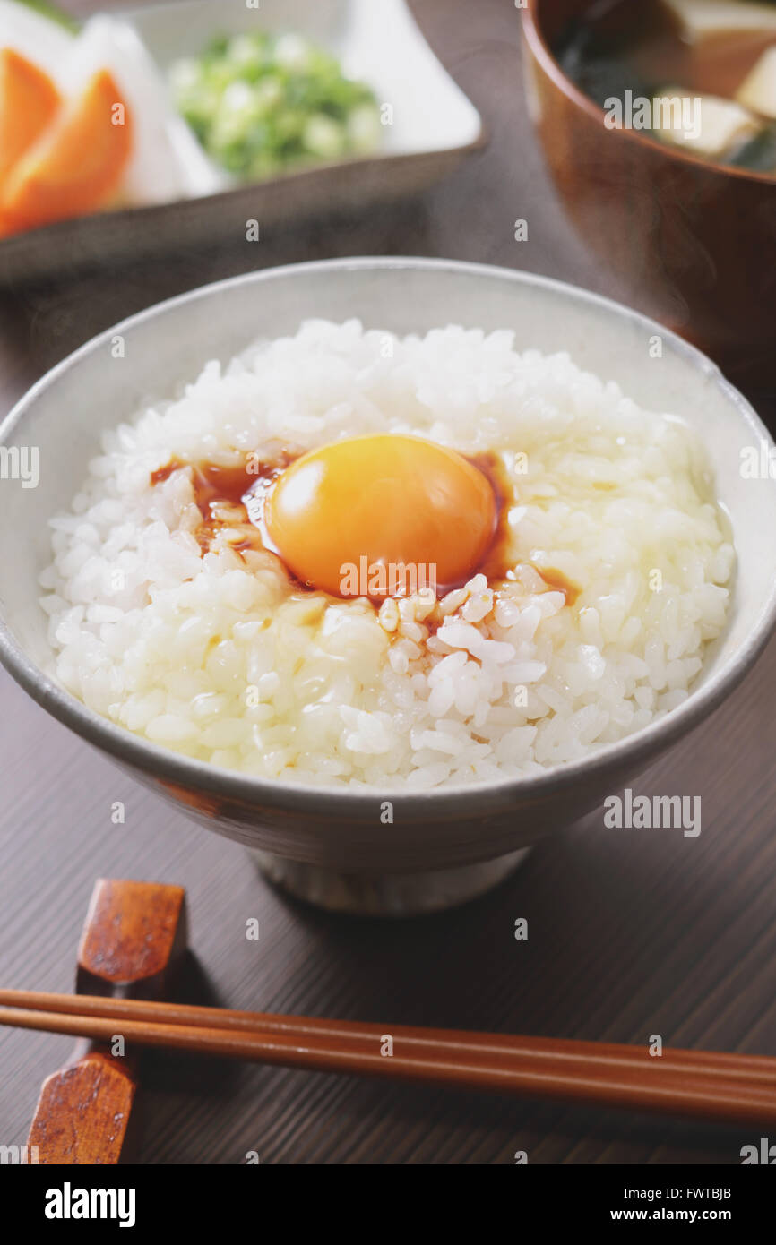 Rice and raw egg Stock Photo - Alamy