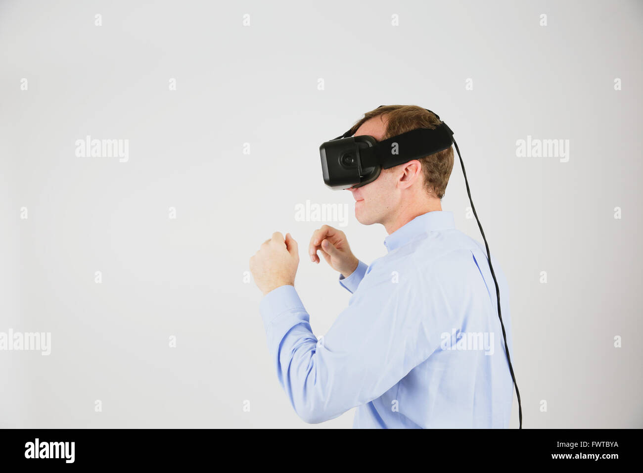 Caucasian man using virtual hi-res stock photography and images - Alamy