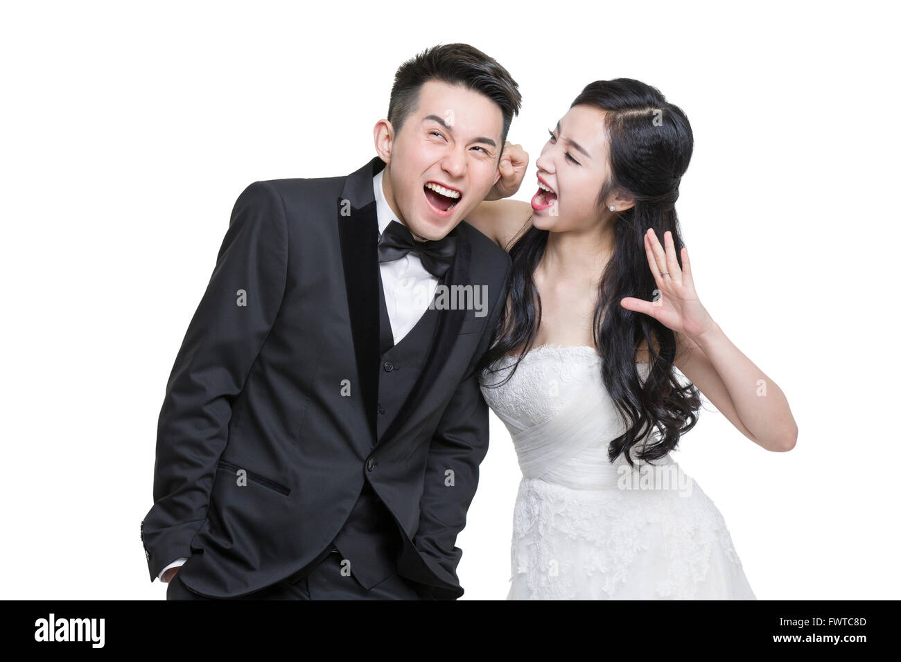 Humorous bride and groom Stock Photo - Alamy