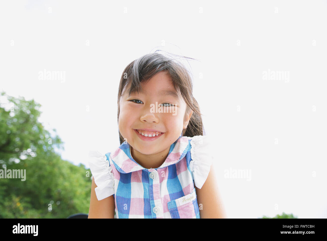 Japanese kid looking at camera Stock Photo - Alamy