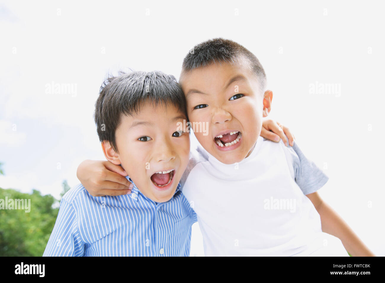 Japanese kids looking at camera Stock Photo - Alamy