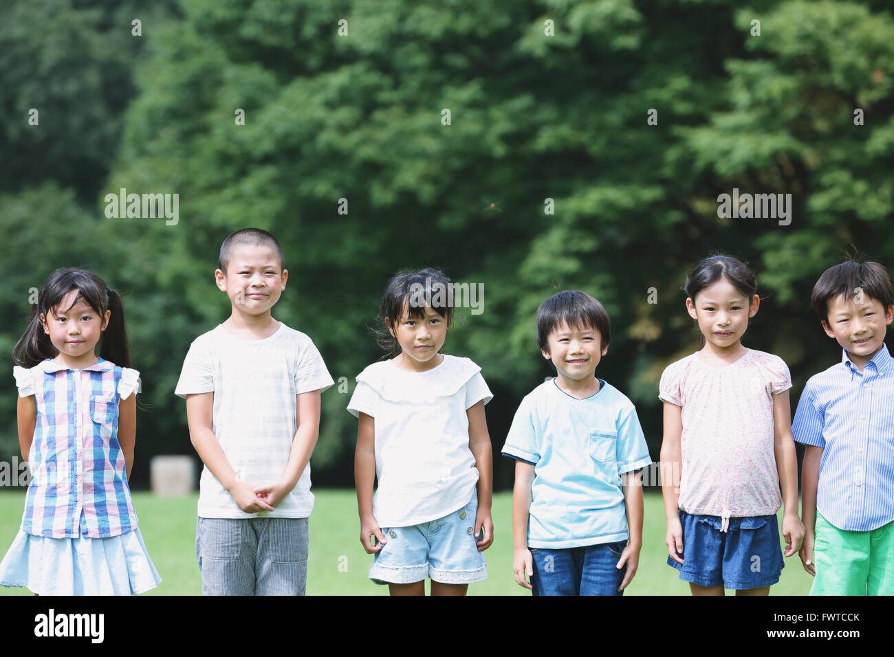 Japanese kids looking at camera Stock Photo - Alamy