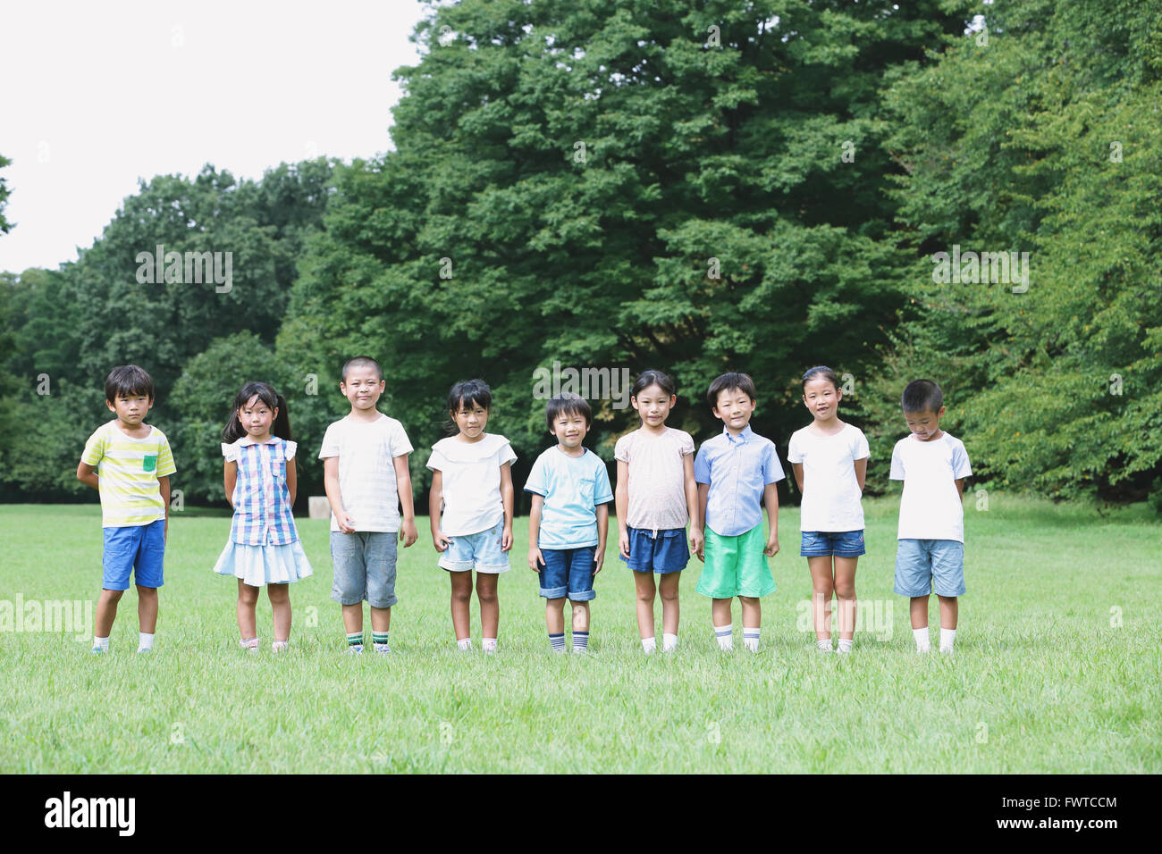 Japanese kids looking at camera Stock Photo - Alamy
