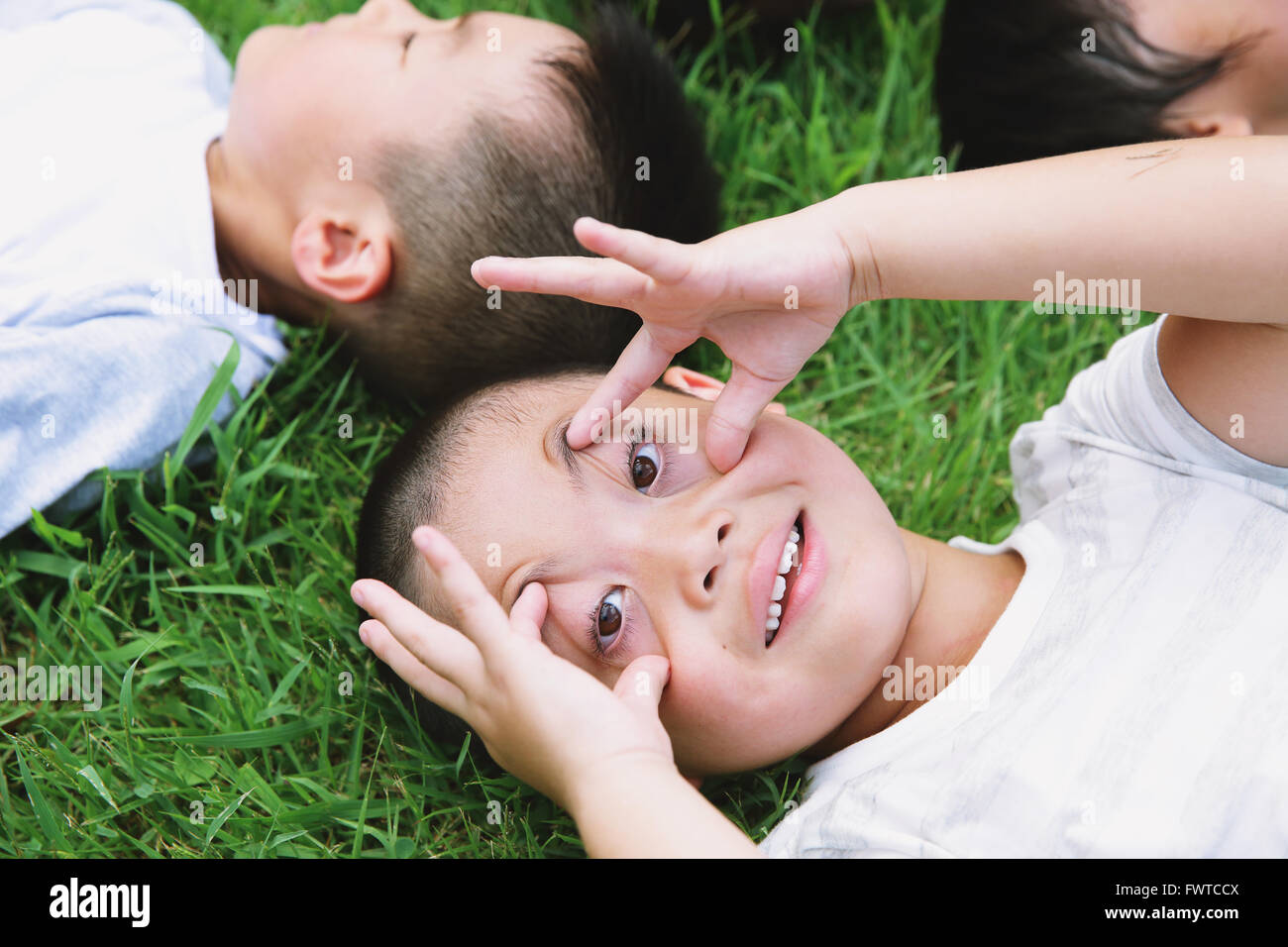 Japanese kids looking at camera Stock Photo - Alamy