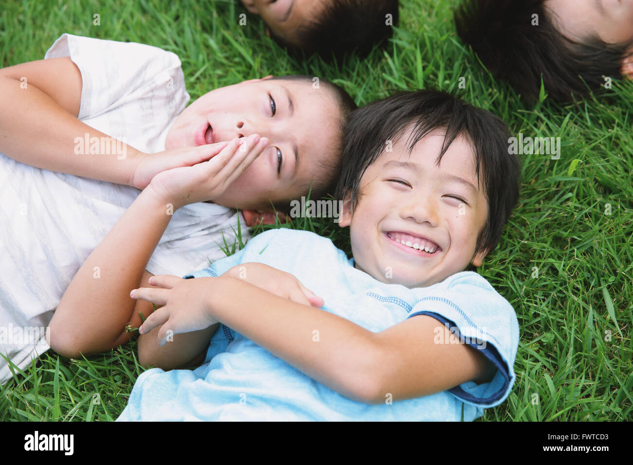 Japanese kids looking at camera Stock Photo - Alamy