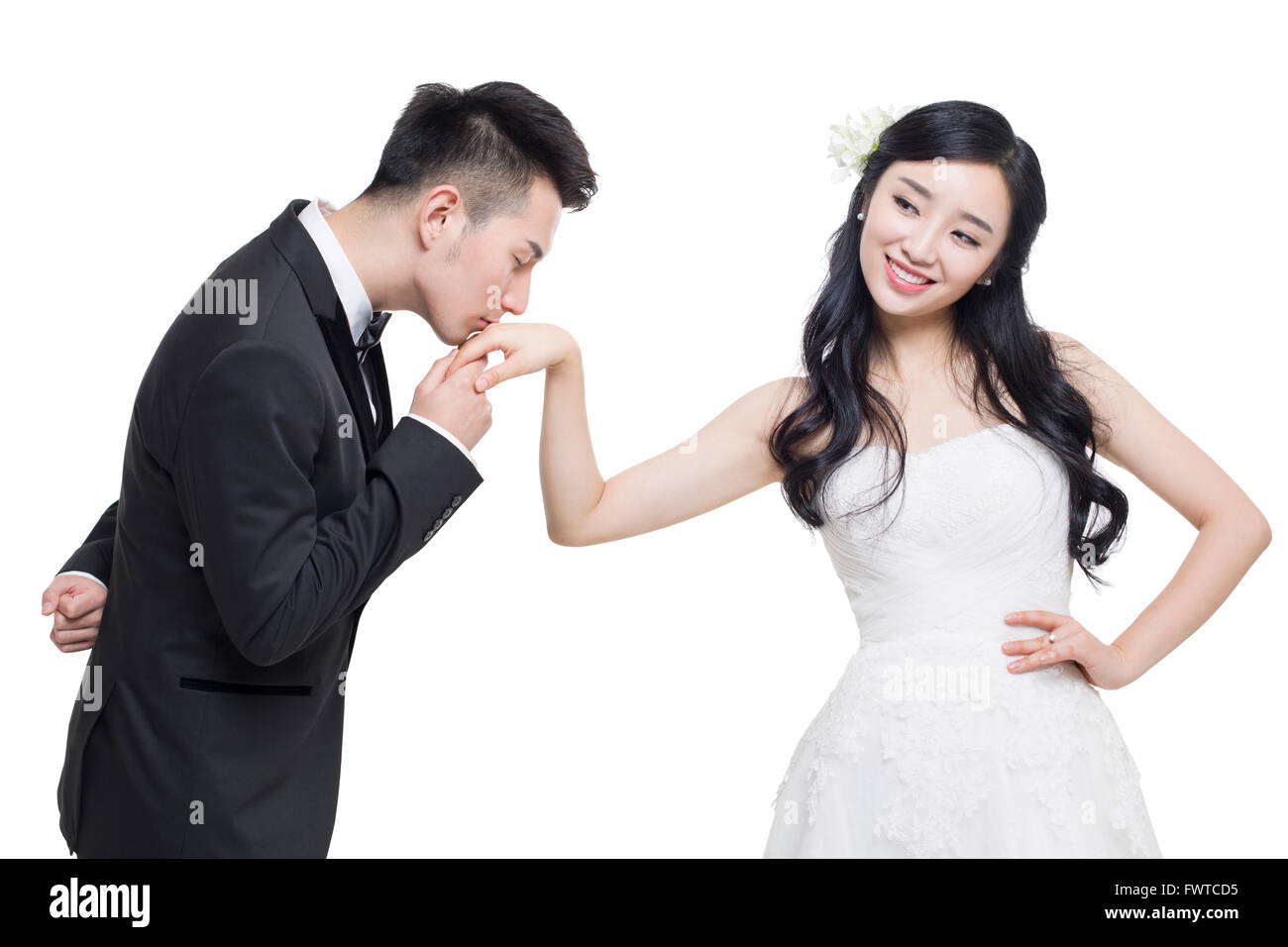 Groom hand on bride Cut Out Stock Images & Pictures - Alamy