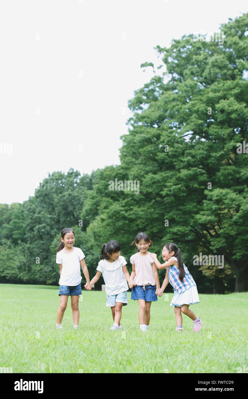 Japanese girls holding hands hi-res stock photography and images - Alamy
