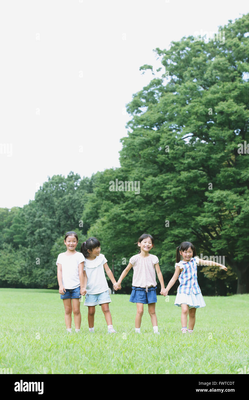 Japanese girls holding hands hi-res stock photography and images - Alamy