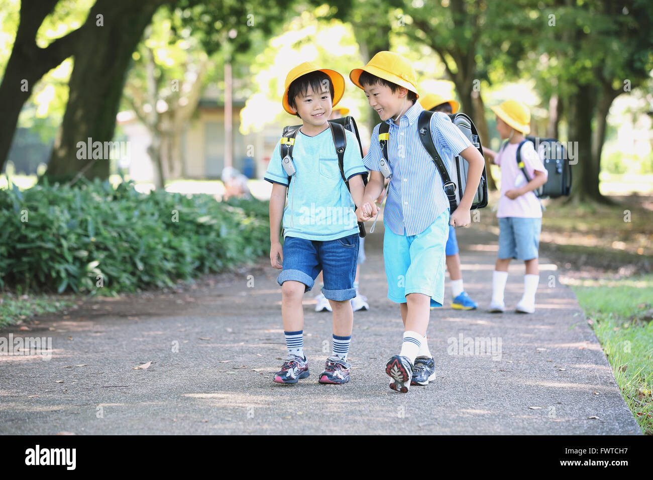 Children playing in park after school hi-res stock photography and ...