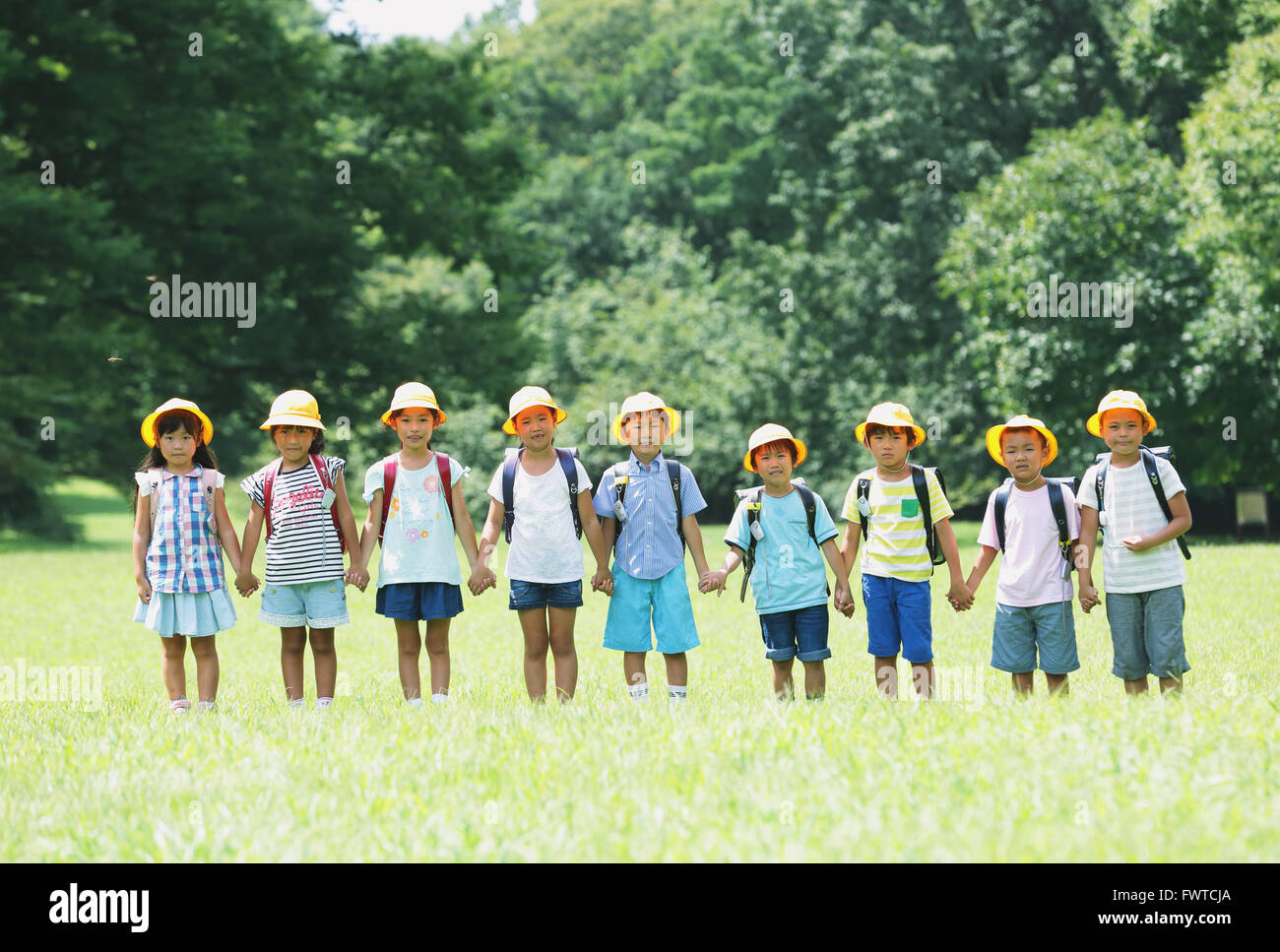 Japanese kids looking at camera Stock Photo - Alamy