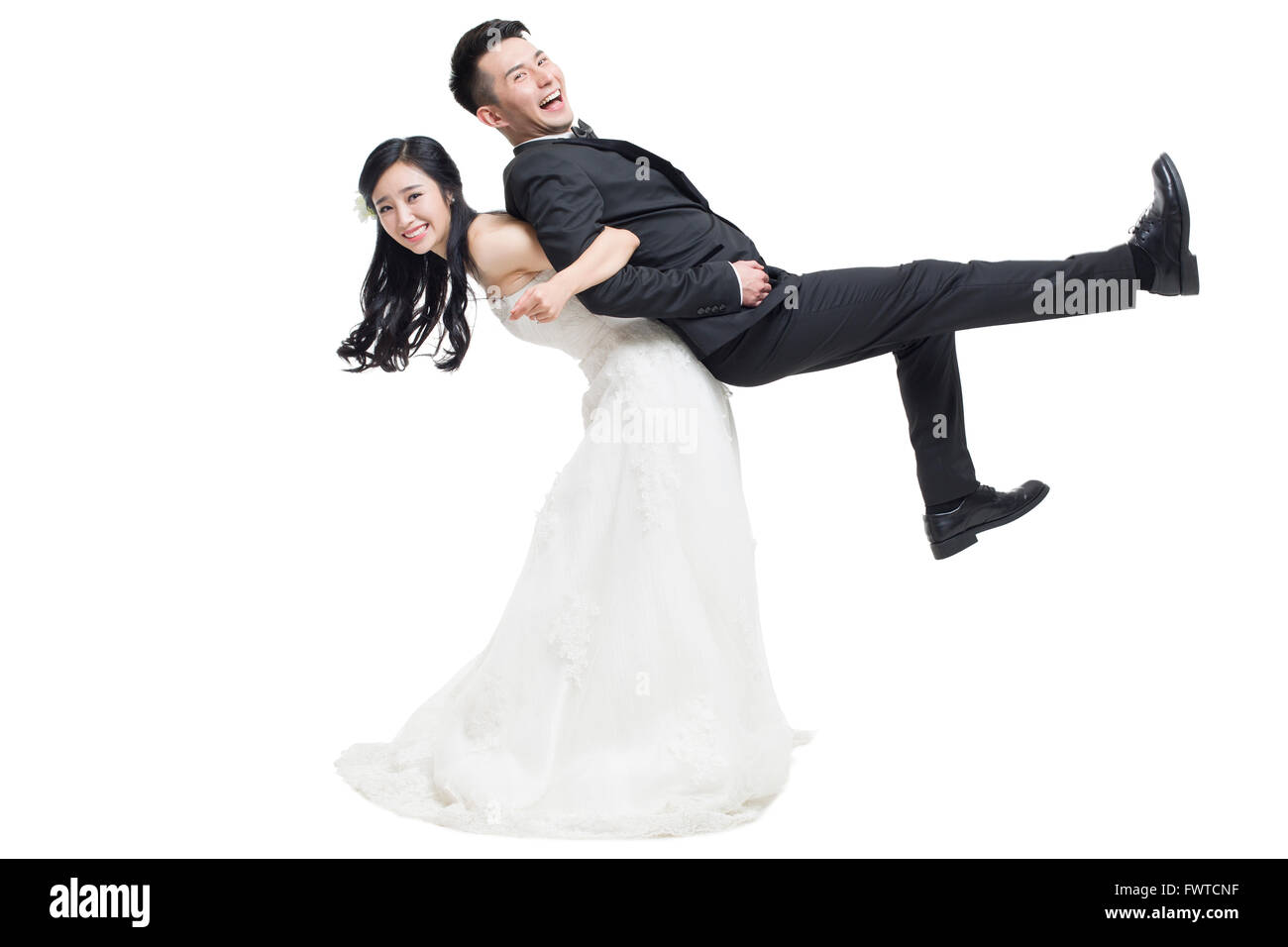Happy bride and groom Stock Photo - Alamy