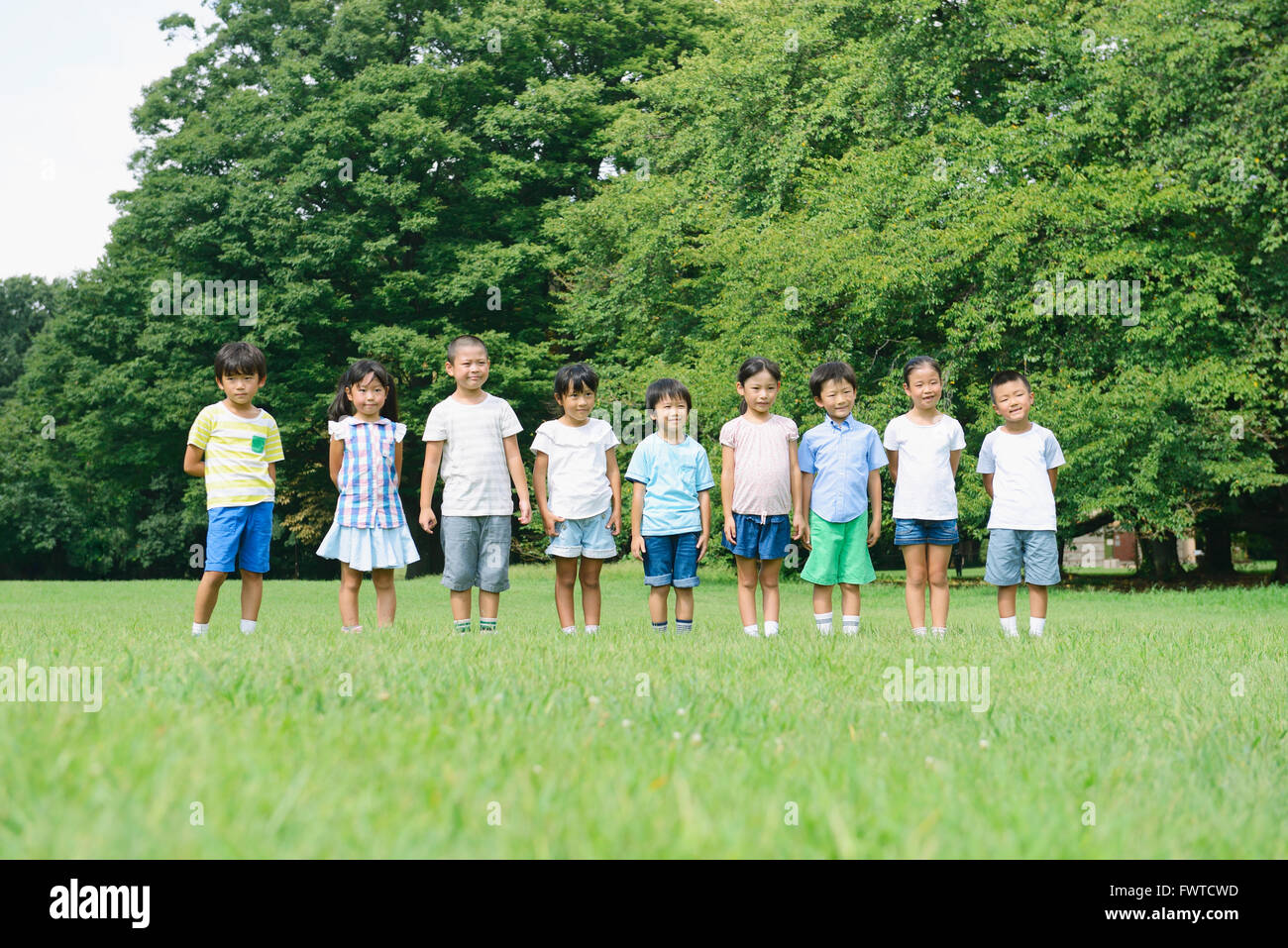 Japanese kids looking at camera Stock Photo - Alamy