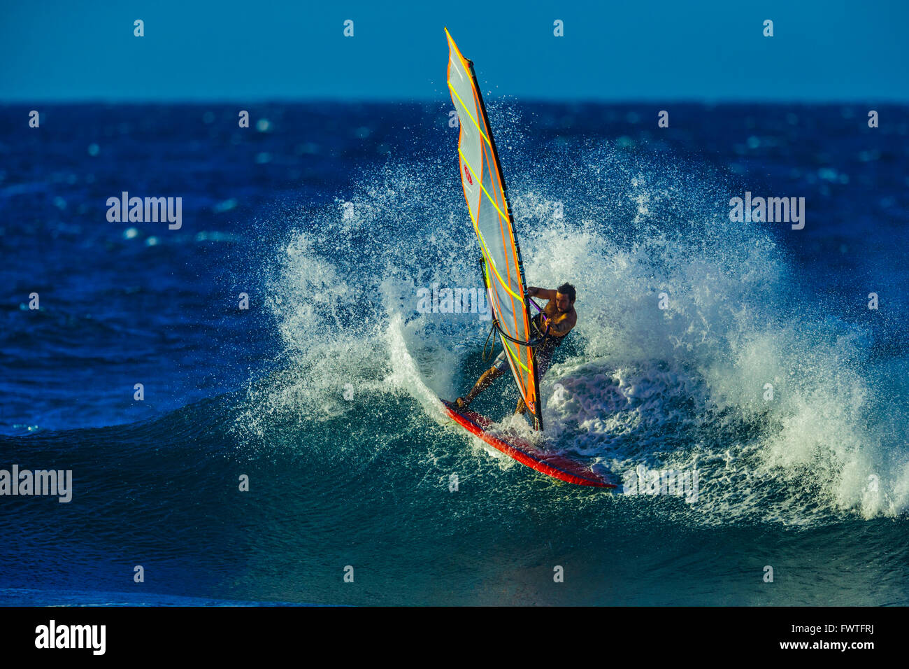 Windsurfing windsurfer sailboard hi-res stock photography and images ...