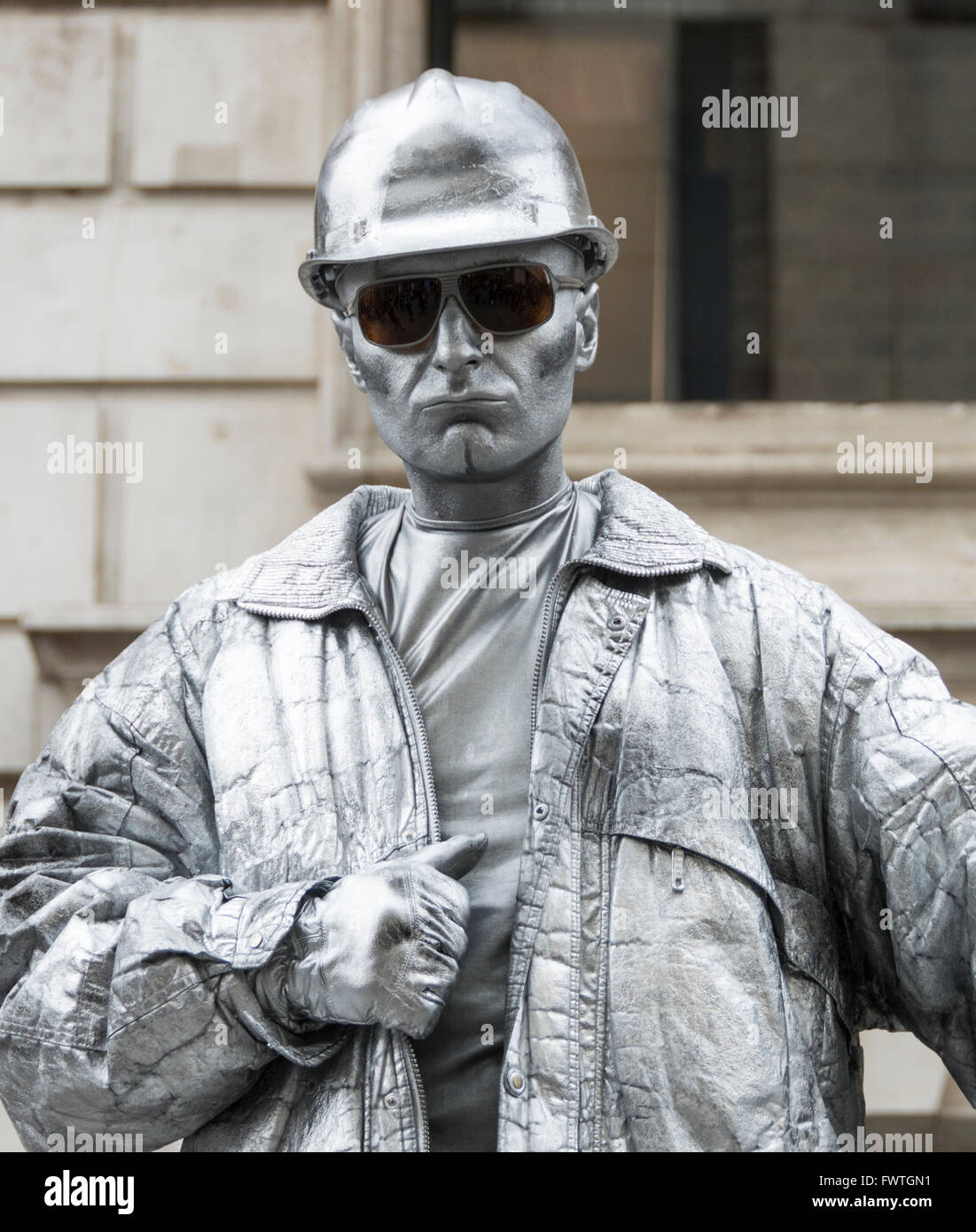 A 'steel man' poses in London's Leicester Square Stock Photo - Alamy