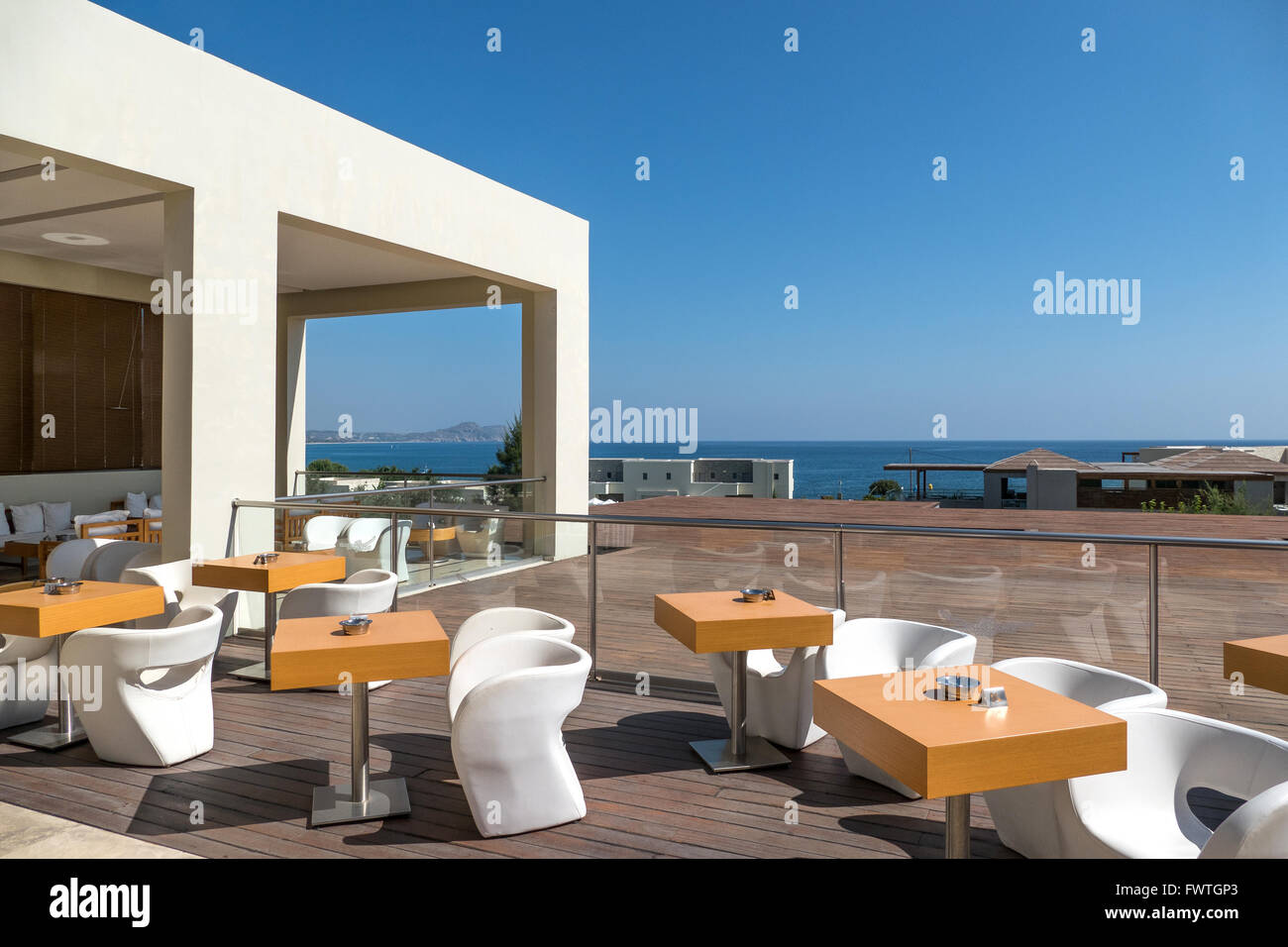 Modern and contemporary outside bar seating and tables Stock Photo - Alamy