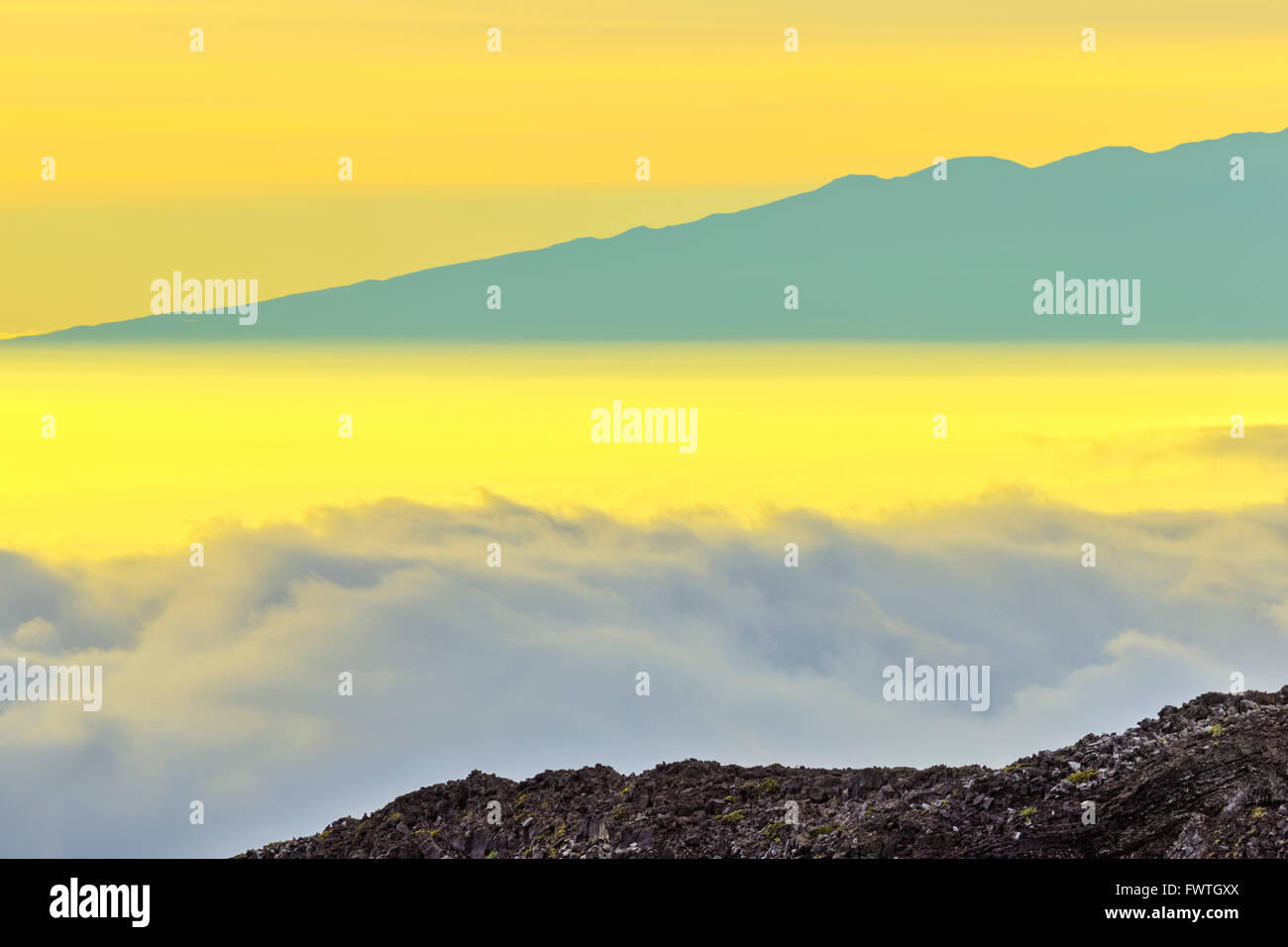 distant view of Mauna Kea on the Big Island from Haleakala Crater at ...