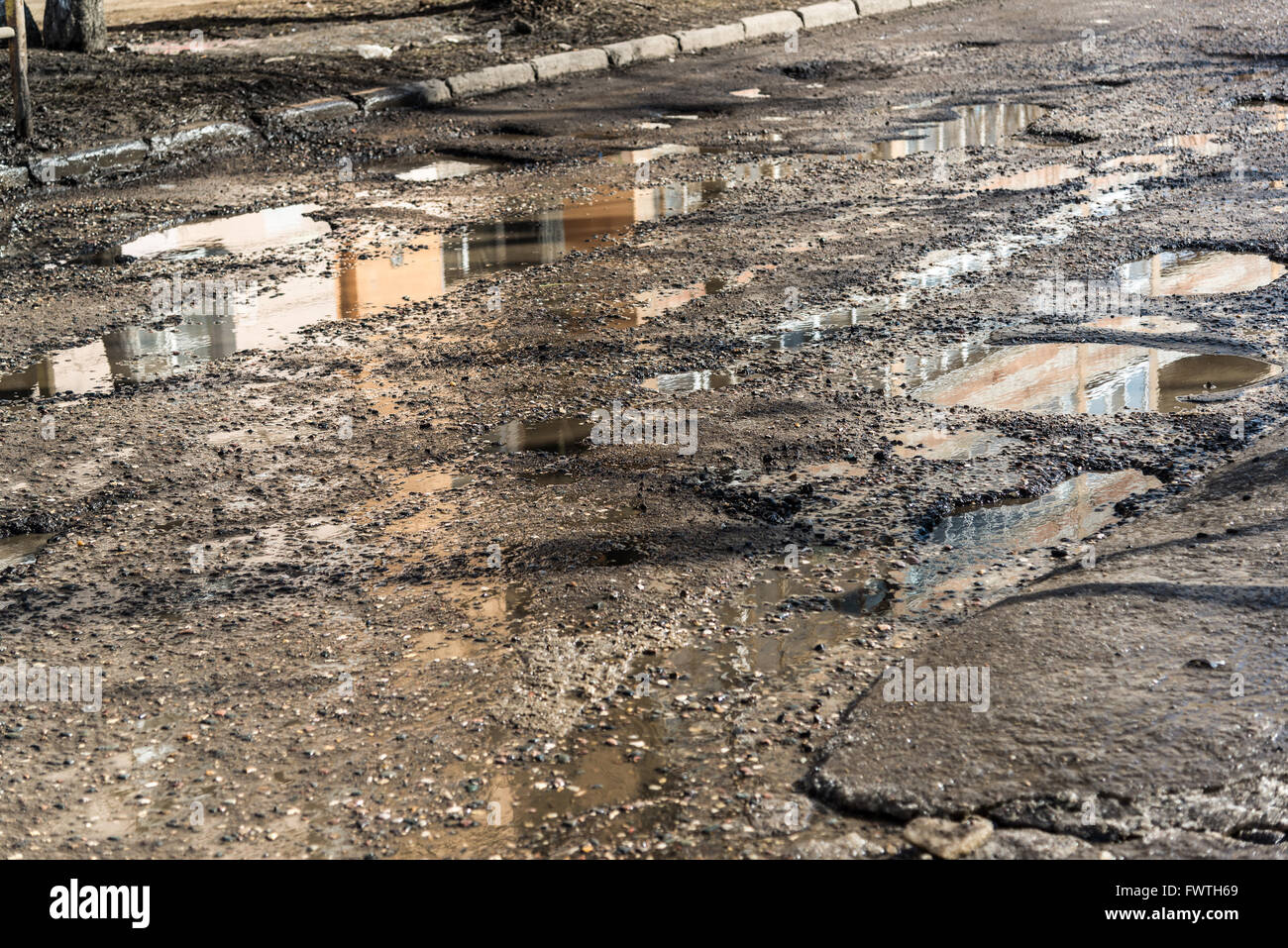 Holes on asphalt road hi-res stock photography and images - Alamy