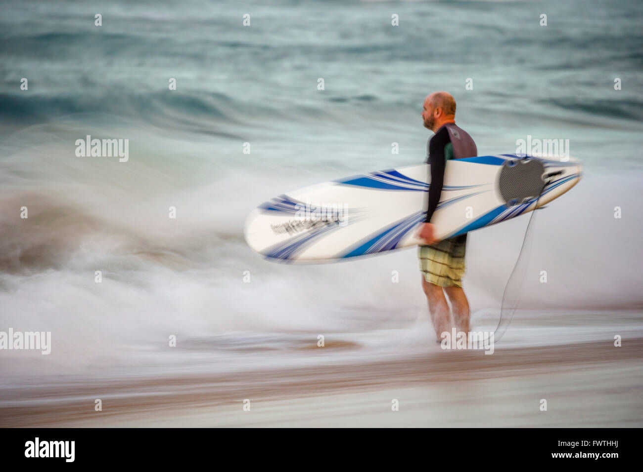 Man watching action of the waves hi-res stock photography and images ...