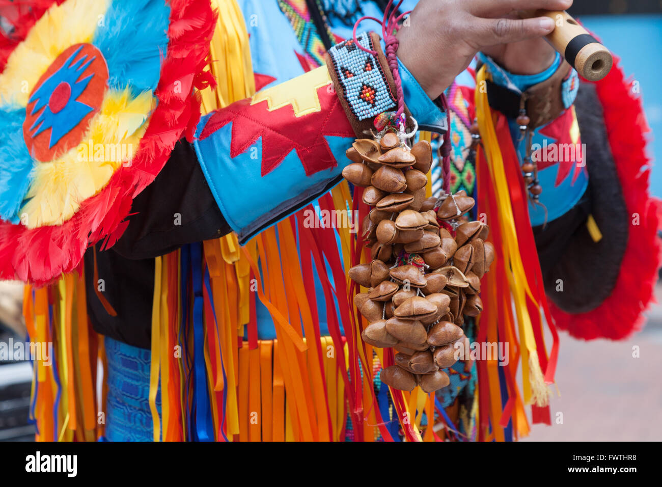 Close up of Peruvian South American musician playing flute and other ...
