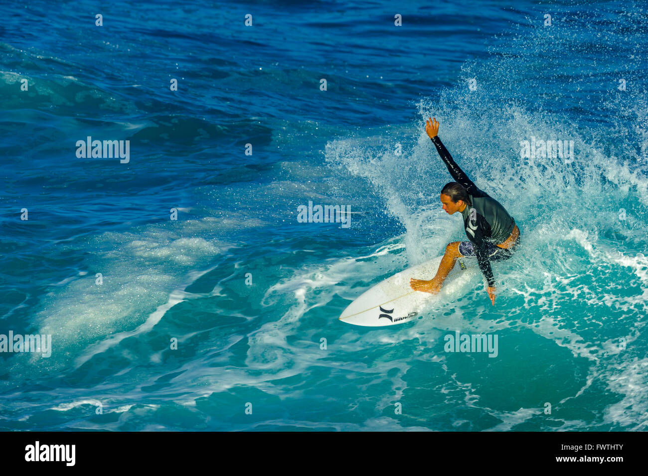 Surfing in Maui Stock Photo - Alamy