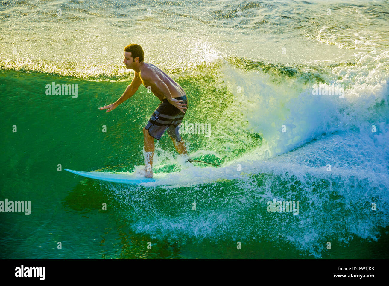 Boy surfing teen wetsuit hi-res stock photography and images - Alamy