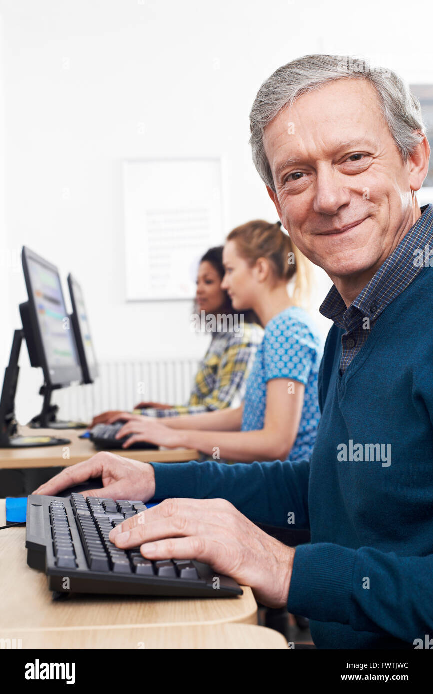 Mature Man Attending Computer Class Stock Photo - Alamy